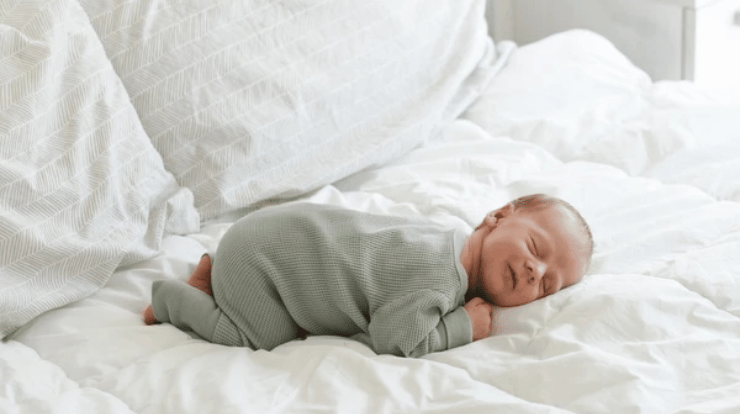5 Reasons Why Do Babies Smile in Their Sleep - Caring Empire